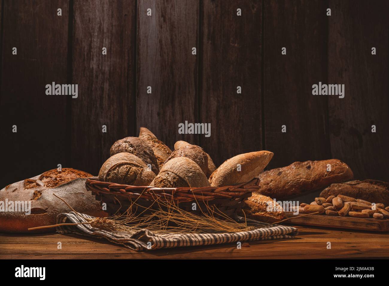 various types of artisan breads made with sourdough from wheat ears and ...