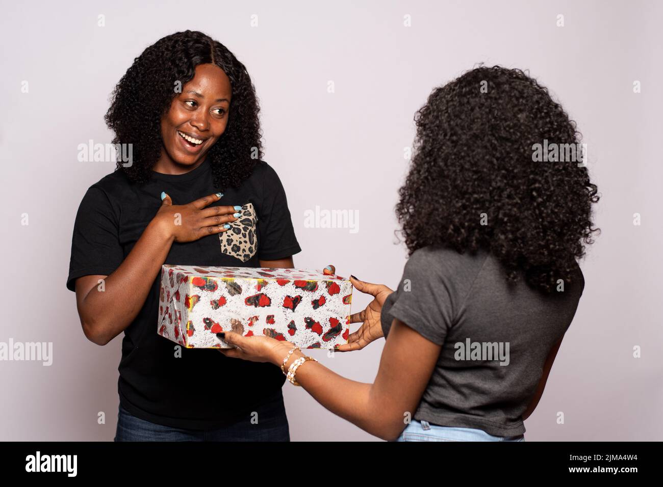 Lady receiving package hi-res stock photography and images - Alamy