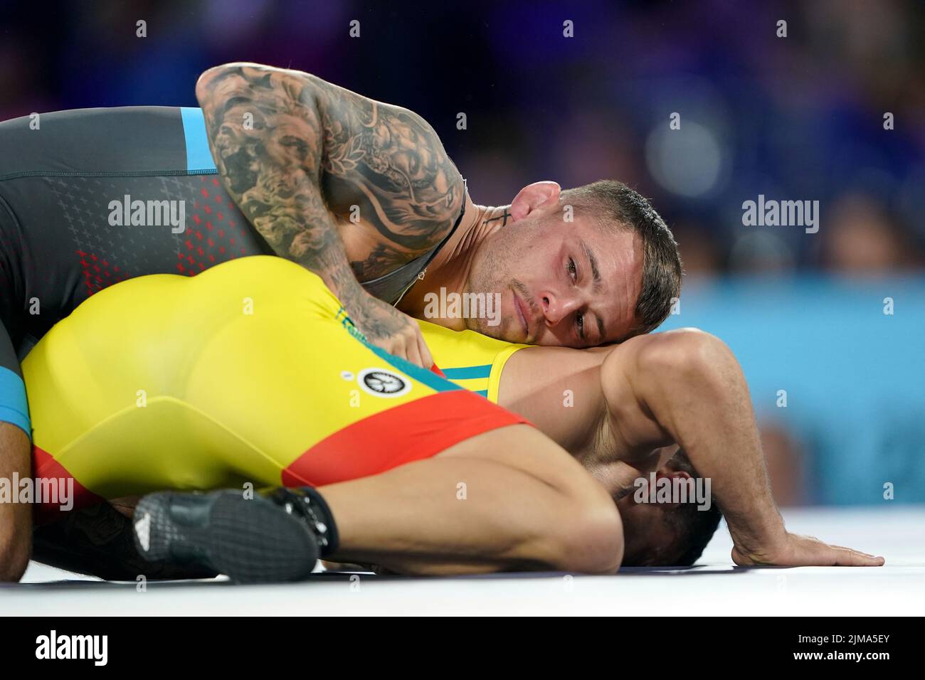 England's George Ramm grapples with Australia's Mostafa Rezaeifar ...