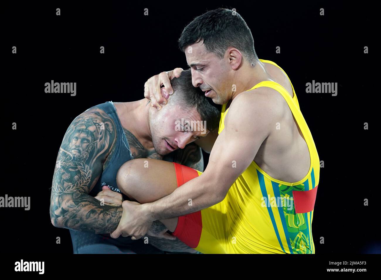 England's George Ramm grapples with Australia's Mostafa Rezaeifar ...