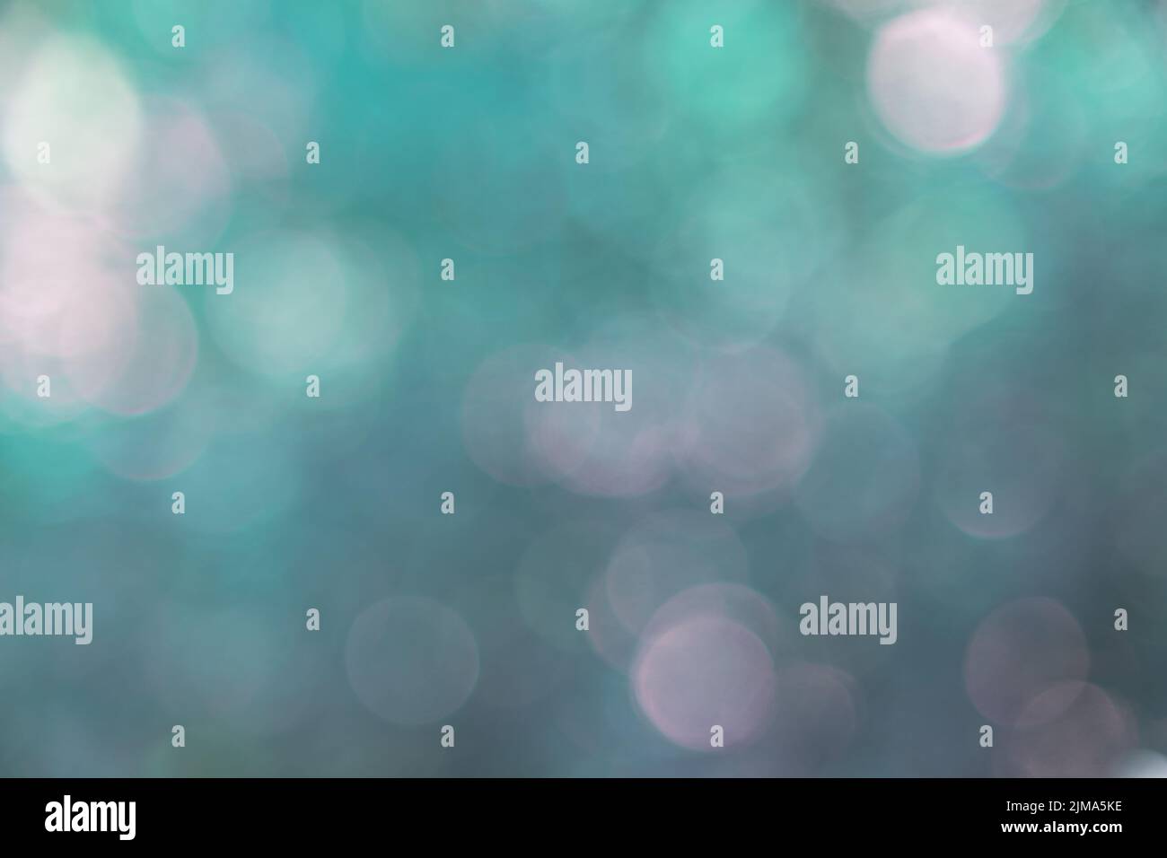 lens flares, blurred bokeh lights in white on turquoise background for ...