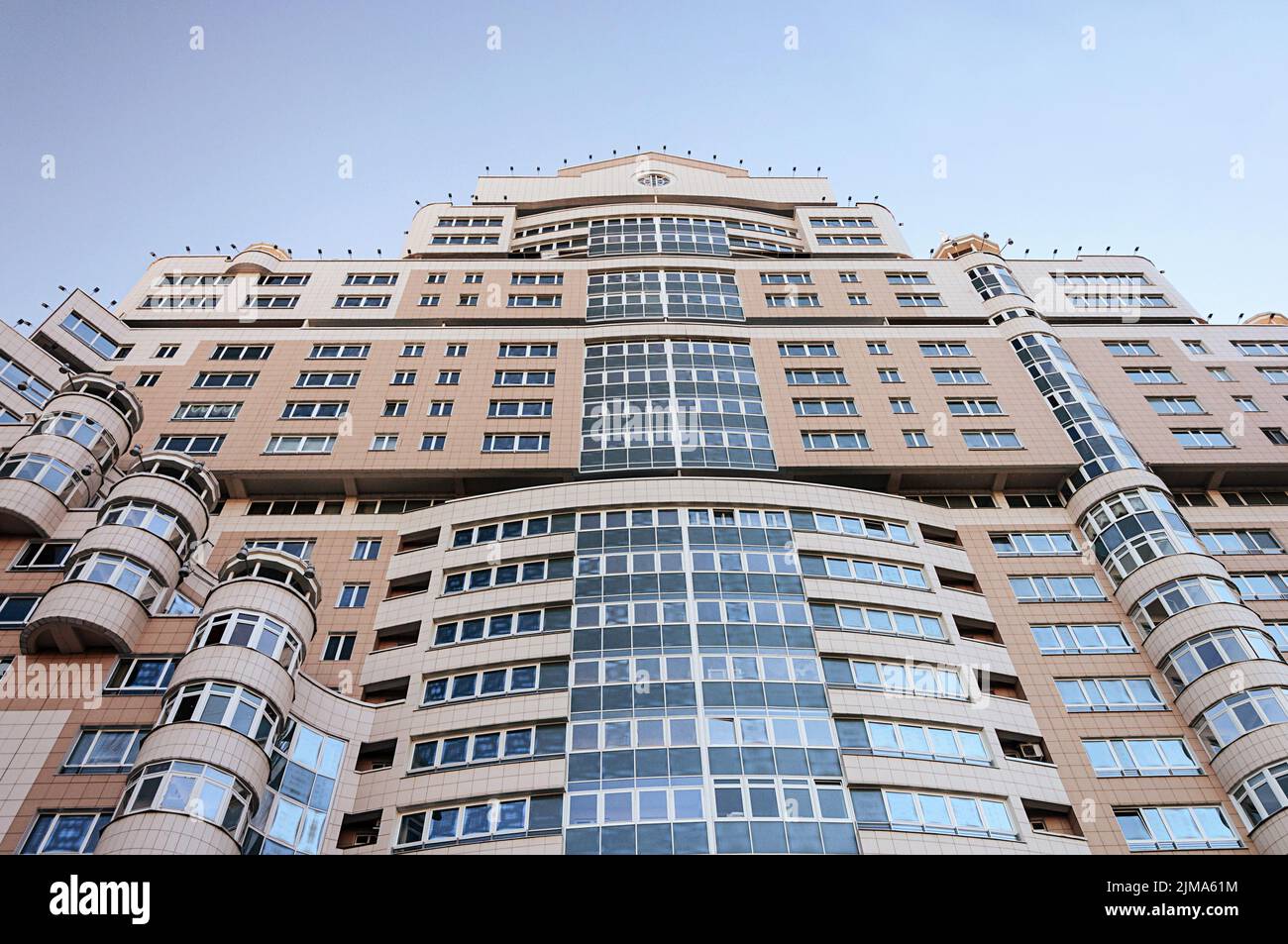 Large modern residential building, view from below Stock Photo - Alamy