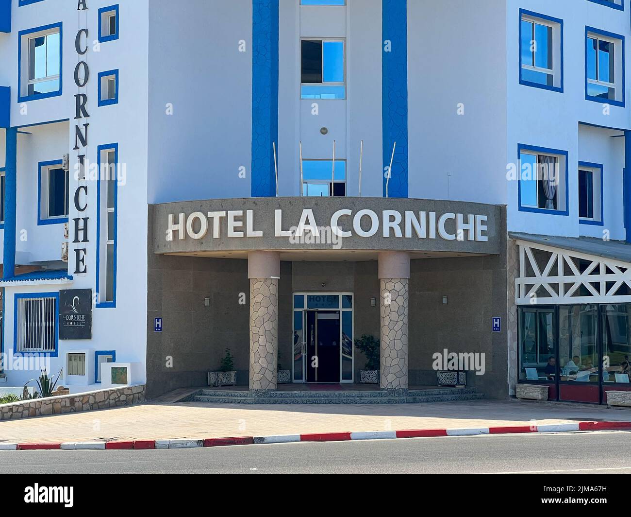 The exterior of hotel La Corniche Stock Photo - Alamy