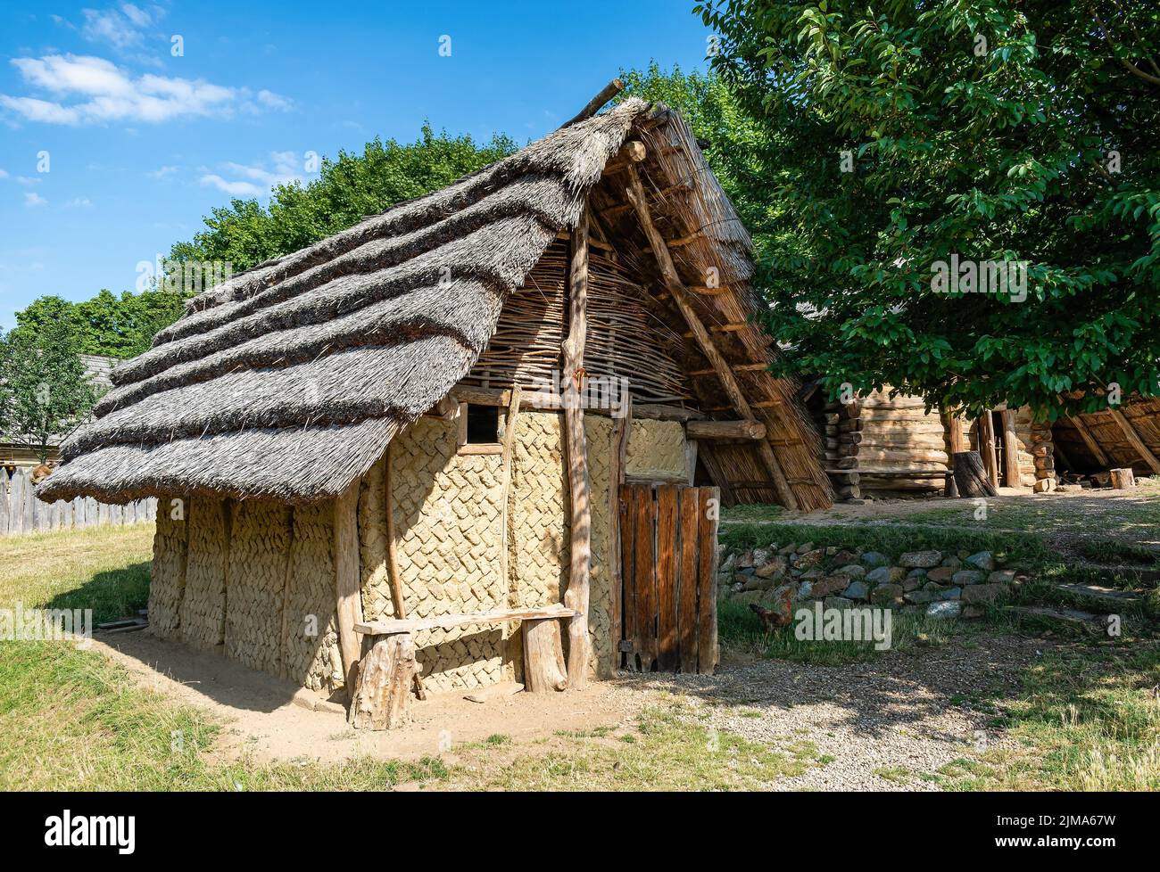 Great Moravian Museum Blue Czech Republic. Mud brick huts, thatched ...