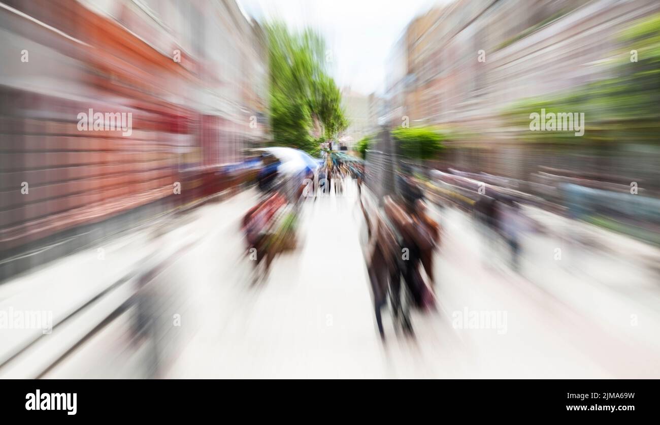 Pedestrian street motion zoom blurred background Stock Photo - Alamy