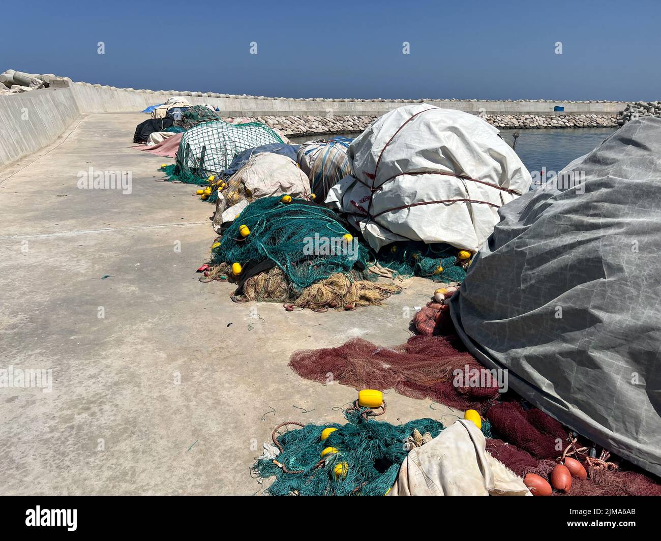 A Closeup of fishing nets on a port Stock Photo - Alamy