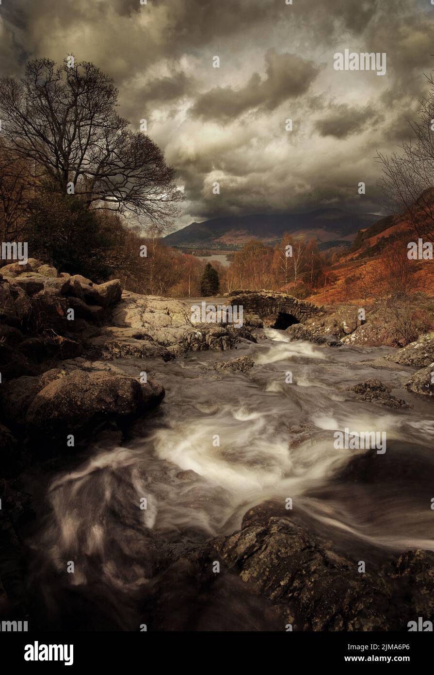 Ashness Bridge captured on a moody day in the Lake District Stock Photo ...