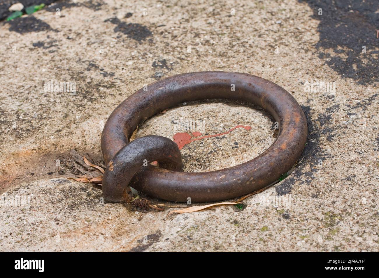 Mooring ring on stone embankment of river Stock Photo - Alamy