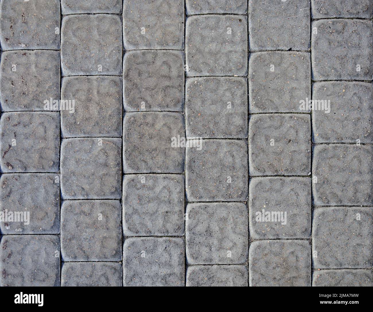 Pavement of concrete tiles Stock Photo - Alamy
