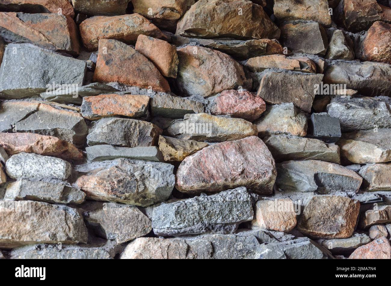 Wall of rough stones Stock Photo - Alamy