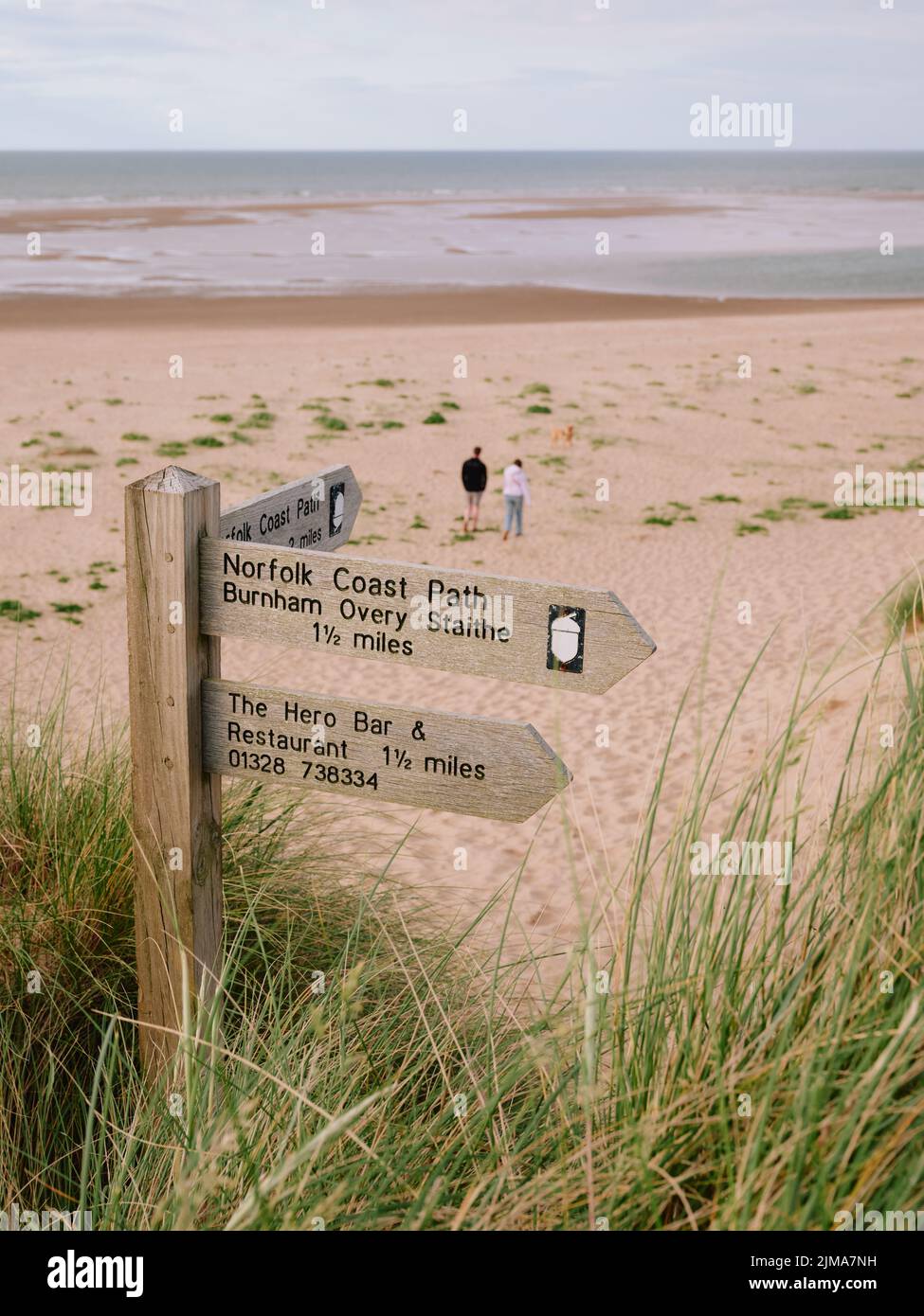 Tourists walking the Burnham Overy Footpath - Norfolk Coastal Path ...