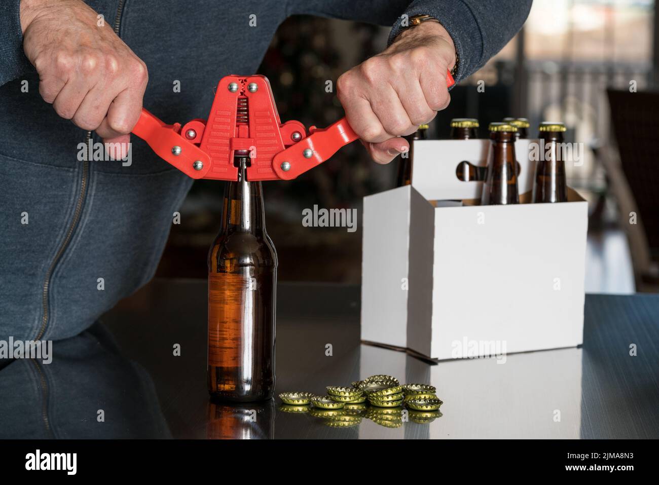 Man using bottle liquid alcohol hi-res stock photography and images - Alamy