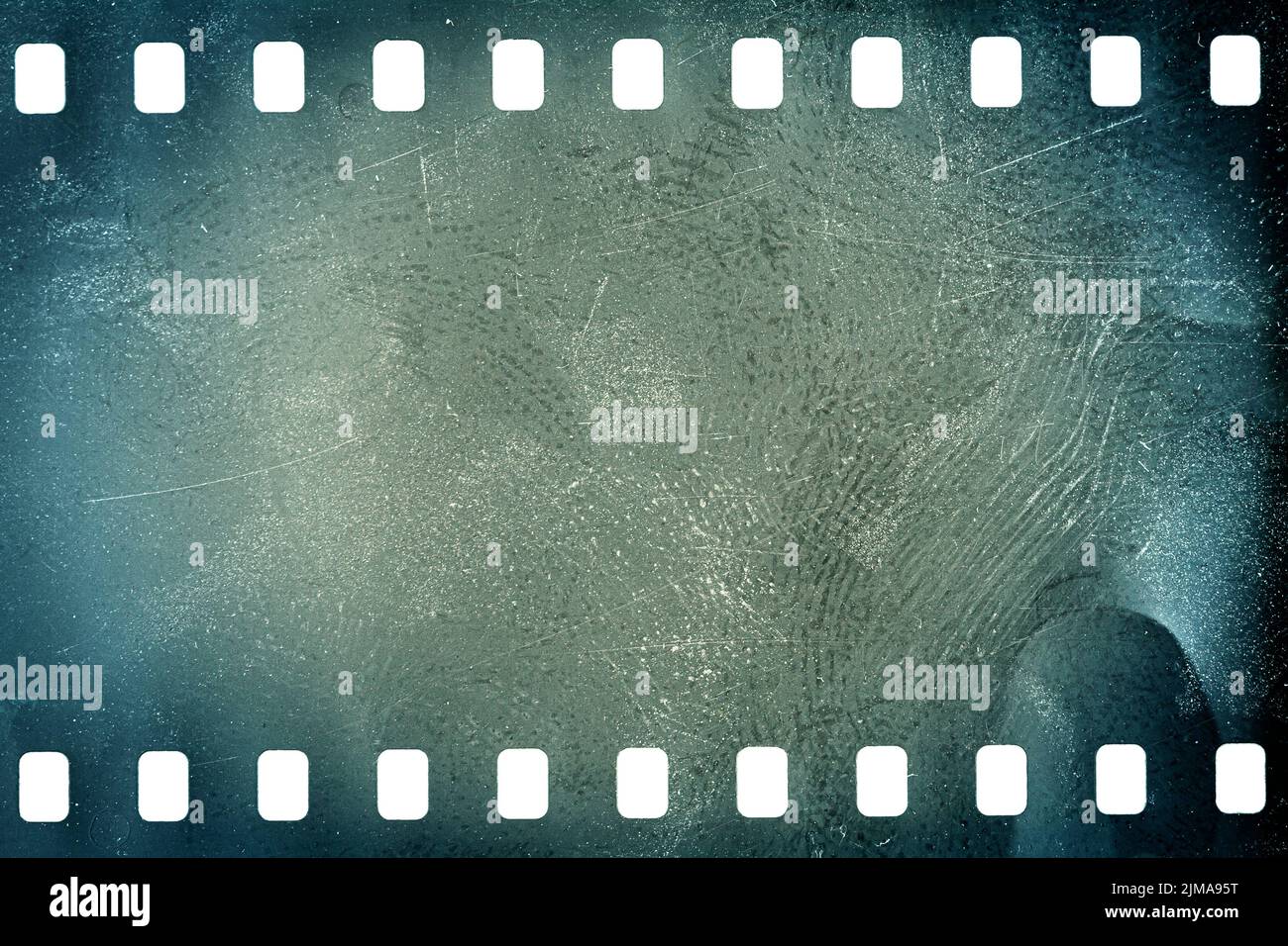 Dusty and grungy 35mm film texture or surface. Perforated scratched ...
