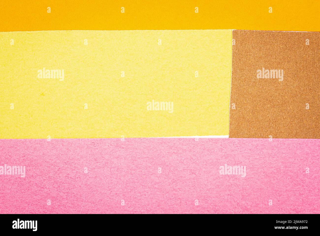 Multicolor background from a paper of different colors. Abstract ...