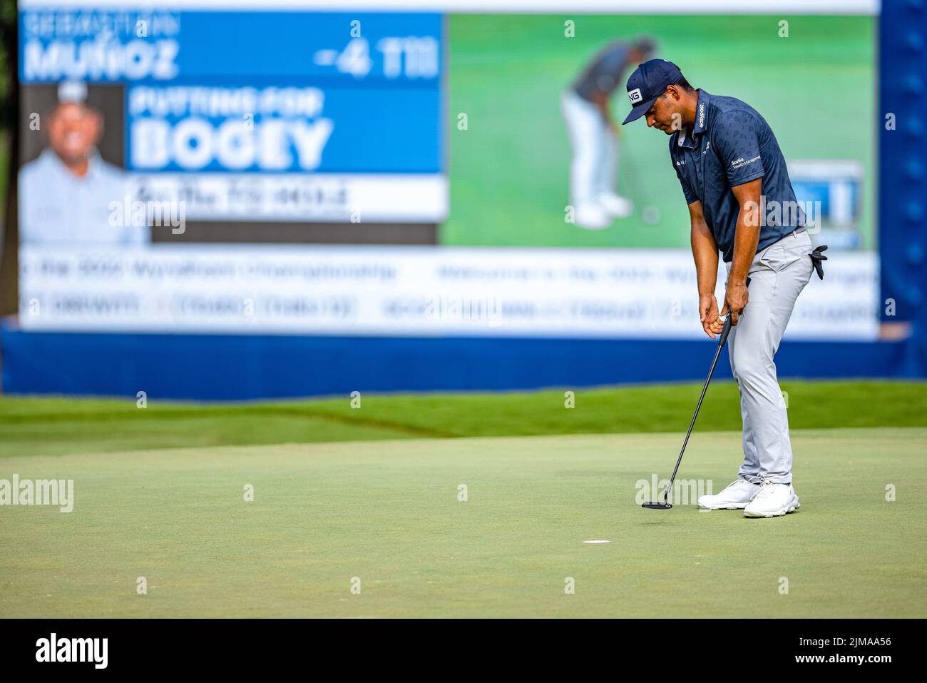 August 4, 2022: Sebastian Munoz taps in a bogey on the 18th green at ...