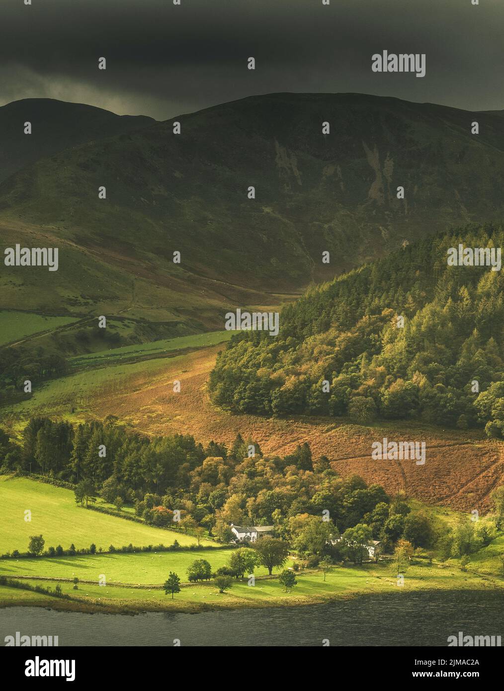 Watergate Farm seen on the shore of Loweswater below Black Crag in the ...