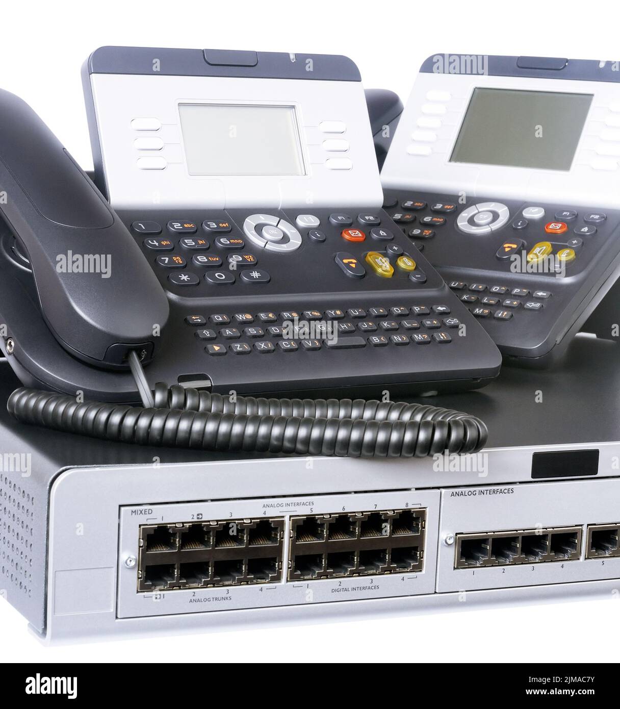 Phone switch system fragment and telephone sets Stock Photo - Alamy