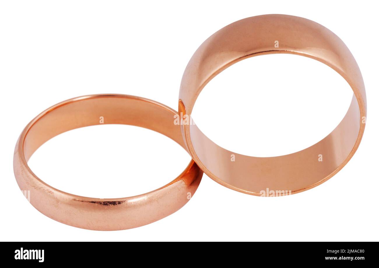 Two wedding golden rings isolated on the white background Stock Photo ...