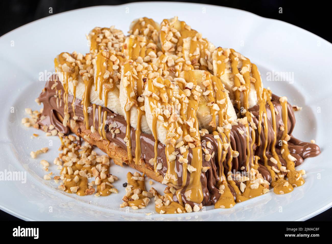 Belgian waffle with white chocolate. Croissant Waffle or Croffle with ...