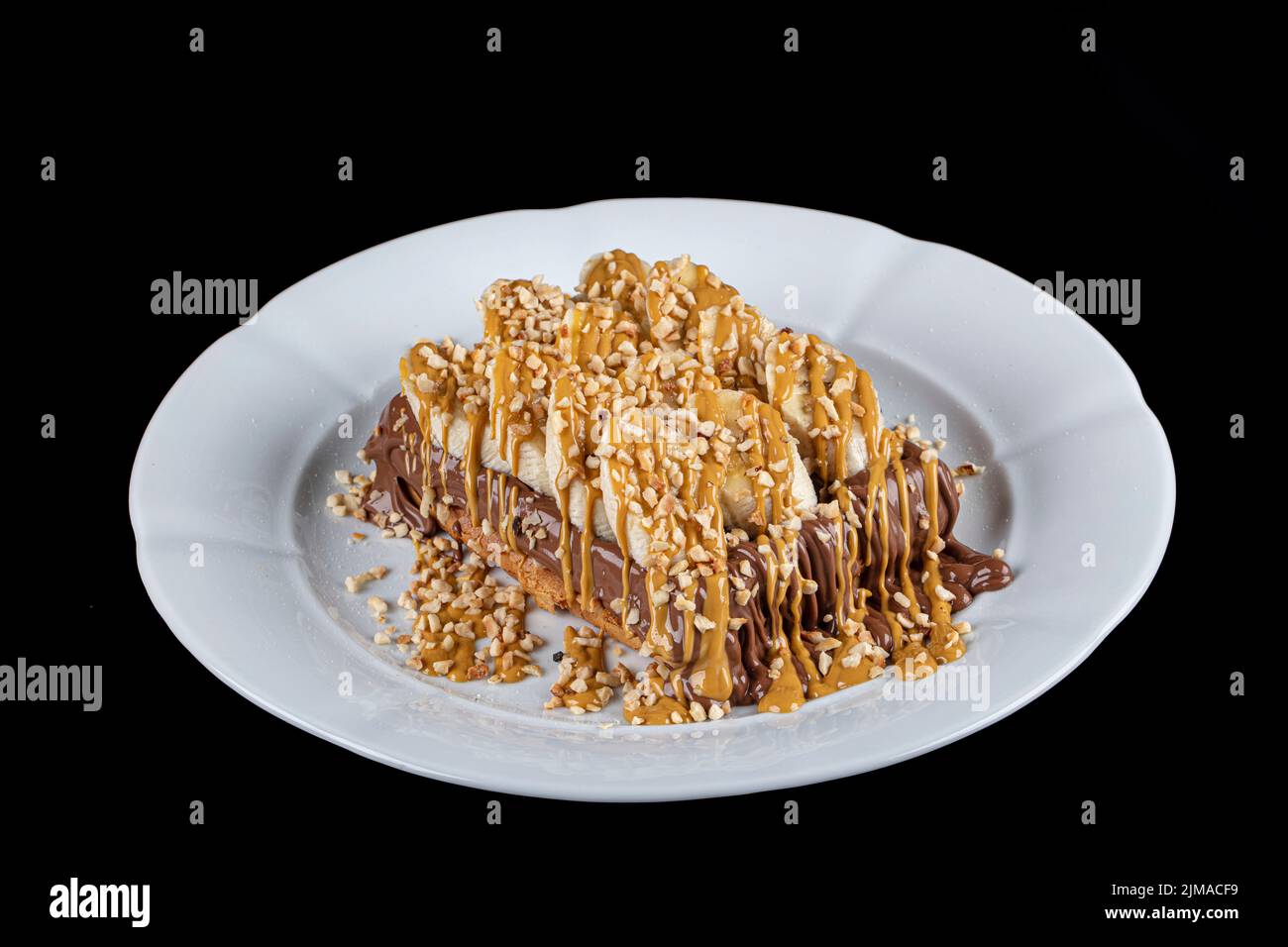 Belgian waffle with white chocolate. Croissant Waffle or Croffle with ...