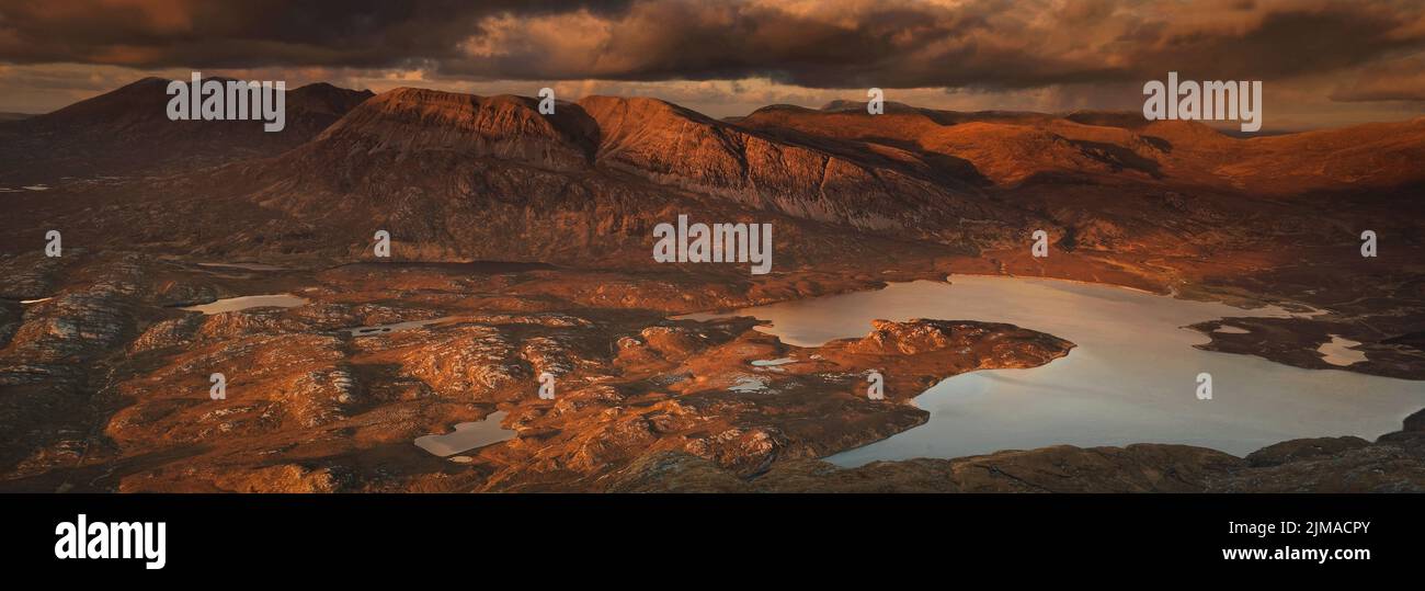 A wild view from Ben Stack towards Loch Stack and the mountains of ...