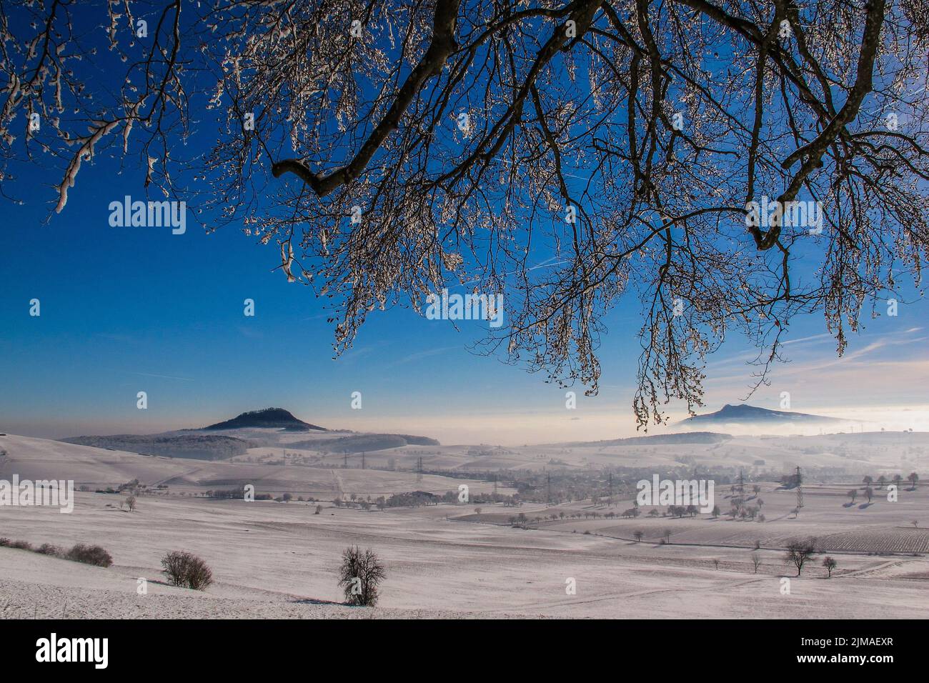Winter landscape with Hohenhewen and Hohenstoffeln Stock Photo - Alamy