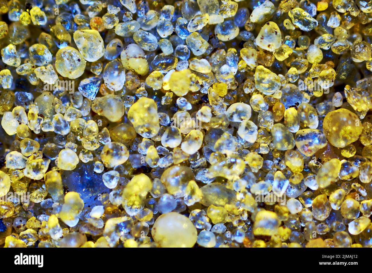 fine multi-colored river sand under a microscope Stock Photo - Alamy