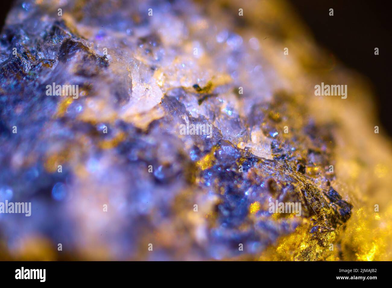 stone ore under the microscope colored stone Stock Photo - Alamy