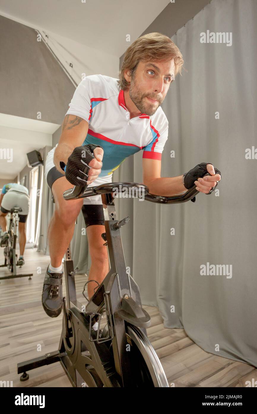 Cycling Gym Determined Male Stock Photo - Alamy