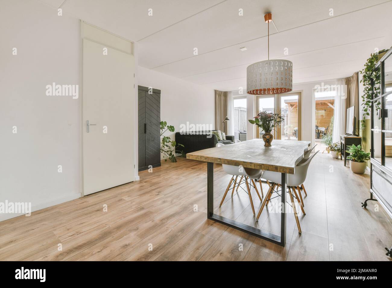 Counters with stove and oven located in modern kitchen near dining room ...