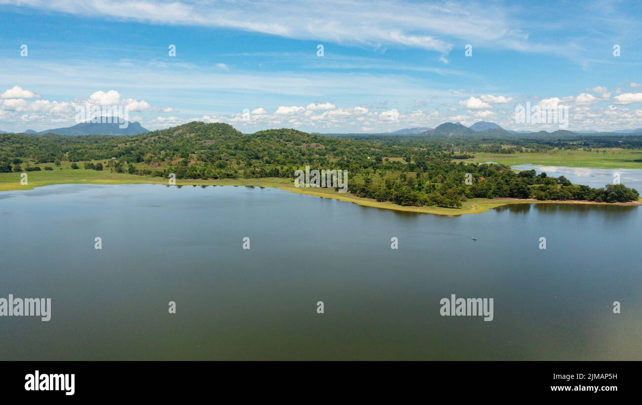 Aerial view of tropical landscape with lake and valley with tropical ...