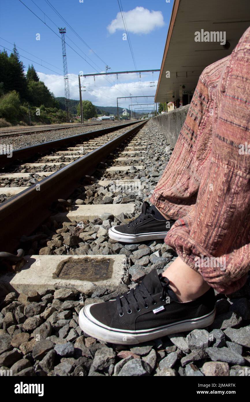 Waiting for the train, on the track Stock Photo - Alamy
