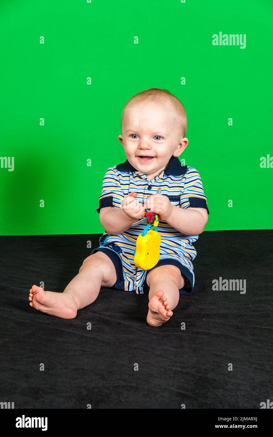 Happy 10 Month Old Baby Boy on Green Screen Stock Photo - Alamy