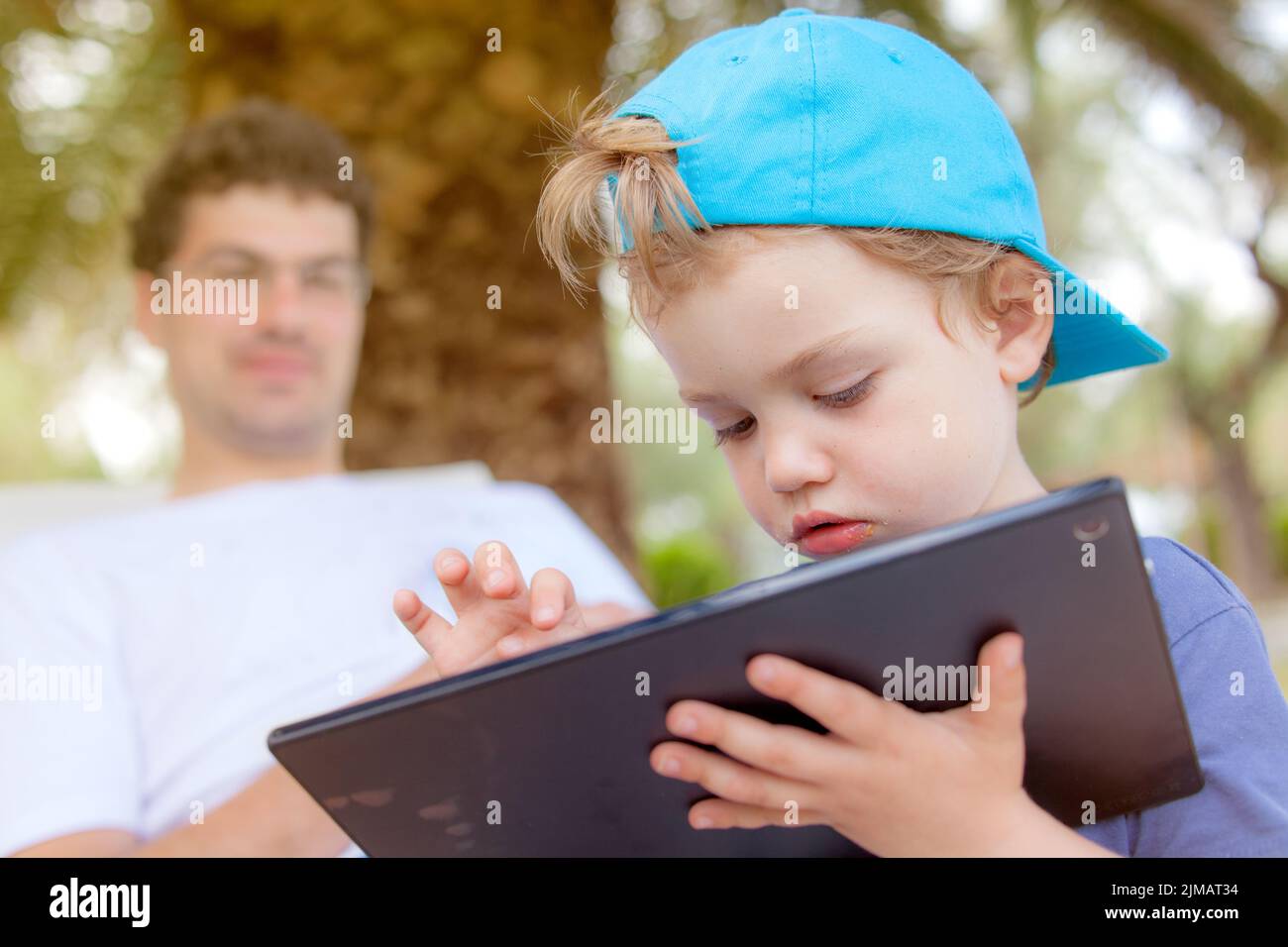 Kid cap computer hi-res stock photography and images - Alamy