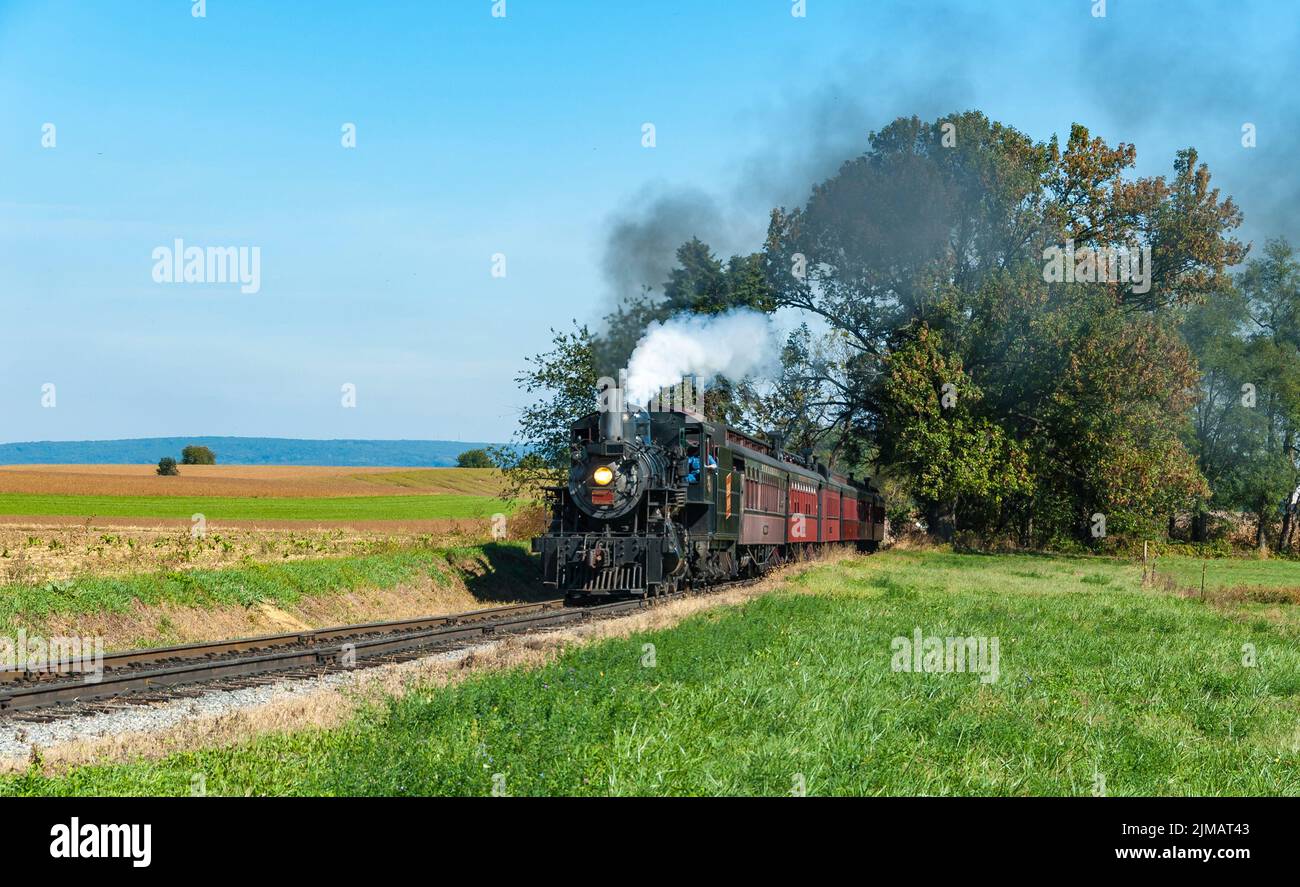Steam Engine and Passenger Train Stock Photo - Alamy