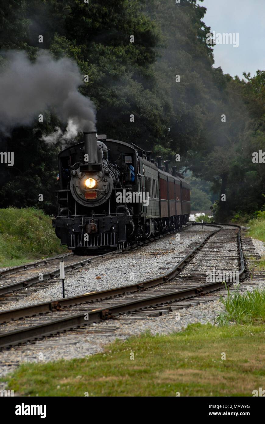 Steam Engine with Passenger Train Pulling into Station pt 2 Stock Photo ...