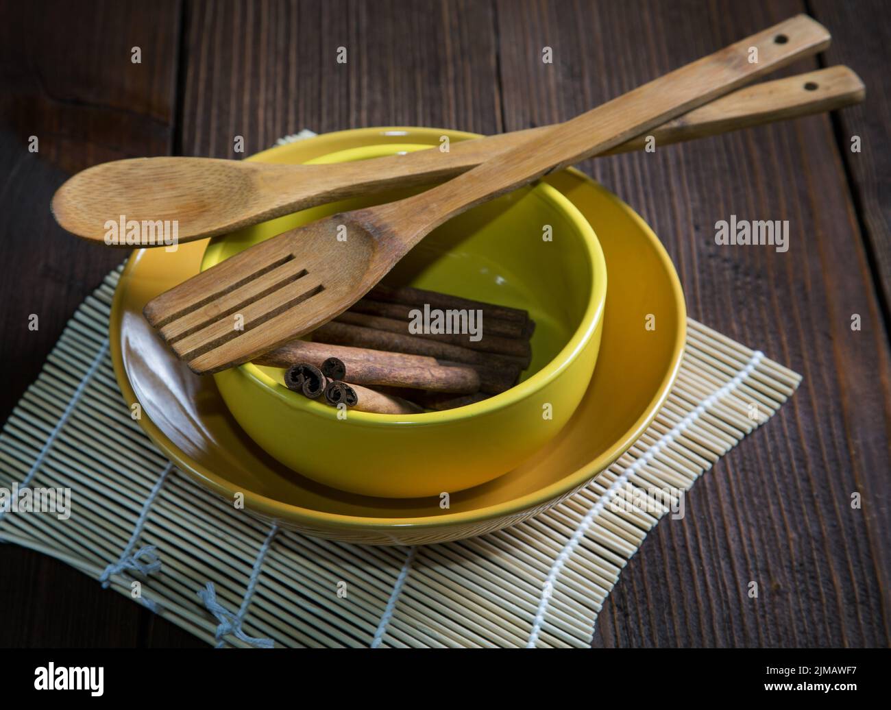 Still life with plates and spatulas for food on an old table Stock ...