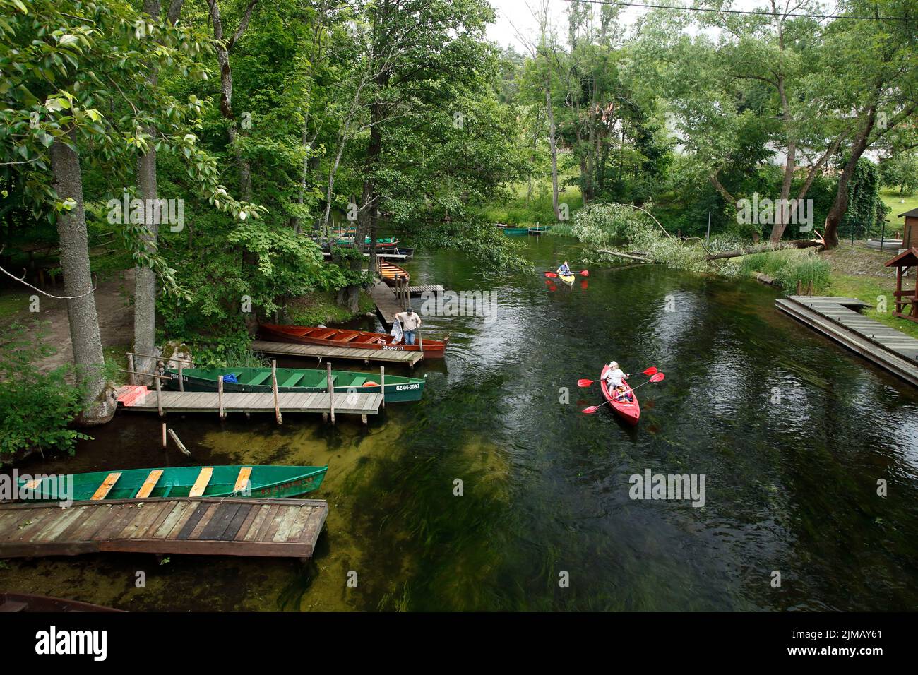 Punt boats and canoes on Krutinia river Stock Photo - Alamy