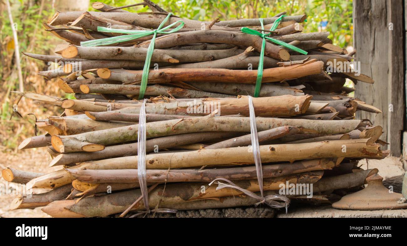 Country stacked and cut logs for firewood Stock Photo - Alamy