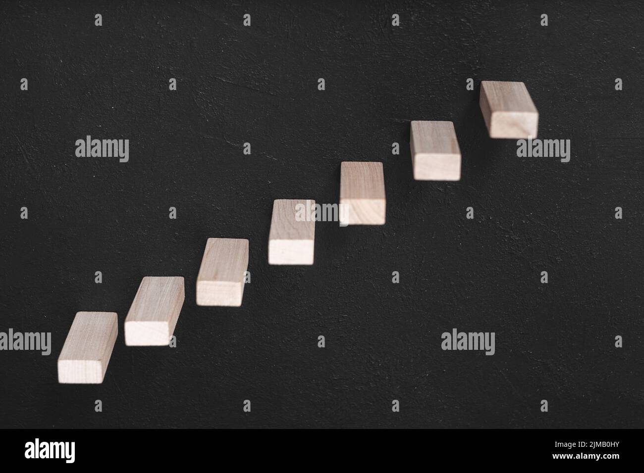 career development leadership wooden bricks stairs Stock Photo - Alamy