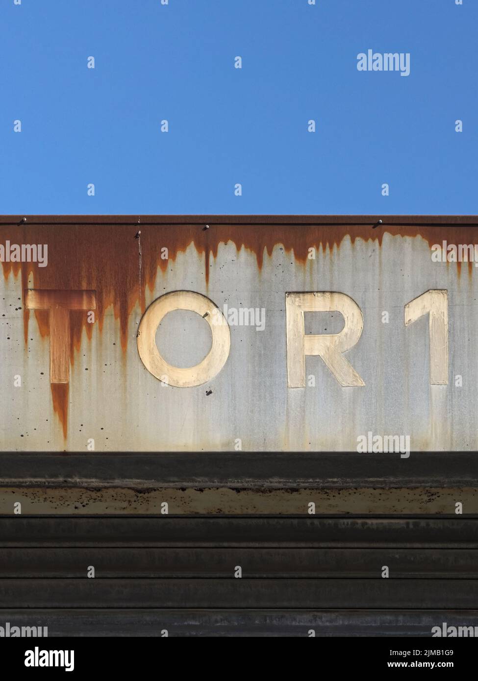 Tor 1 - Warehouse lettering above a roller door, Germany Stock Photo ...