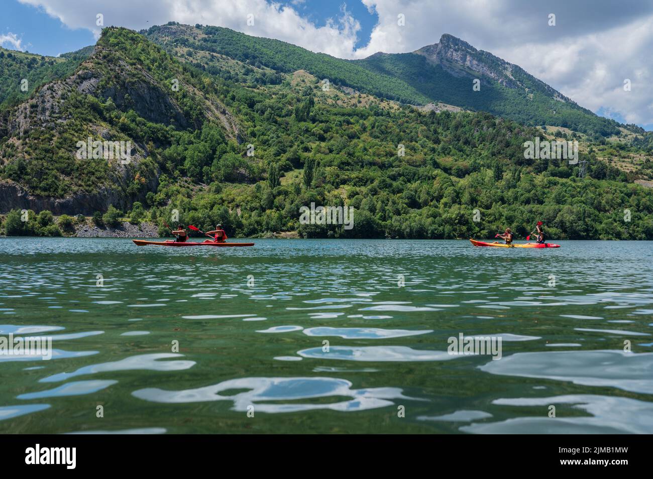 Kayaking in Lanuza reservoir in Sallent de Gallego, Huesca, Spain Stock ...