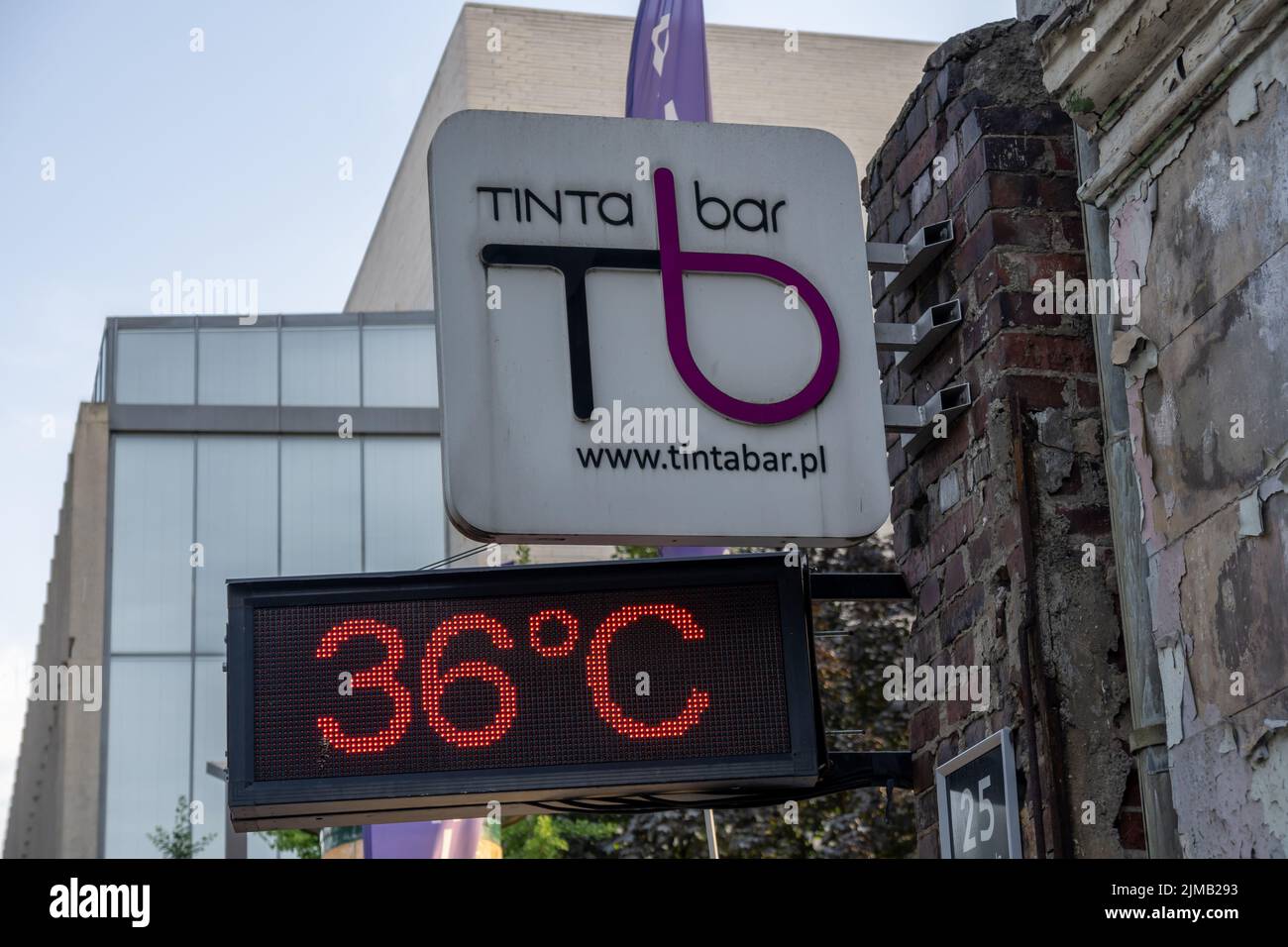 Board of Tinta Bar and a board showing the temperature of 36 degrees ...