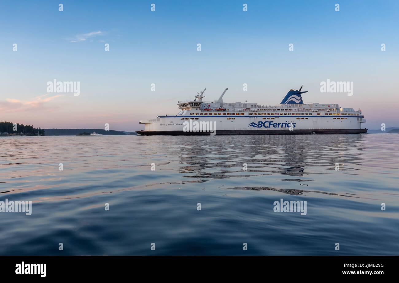 BC Ferries Boat leaving the Terminal in Swartz Bay during colorful ...