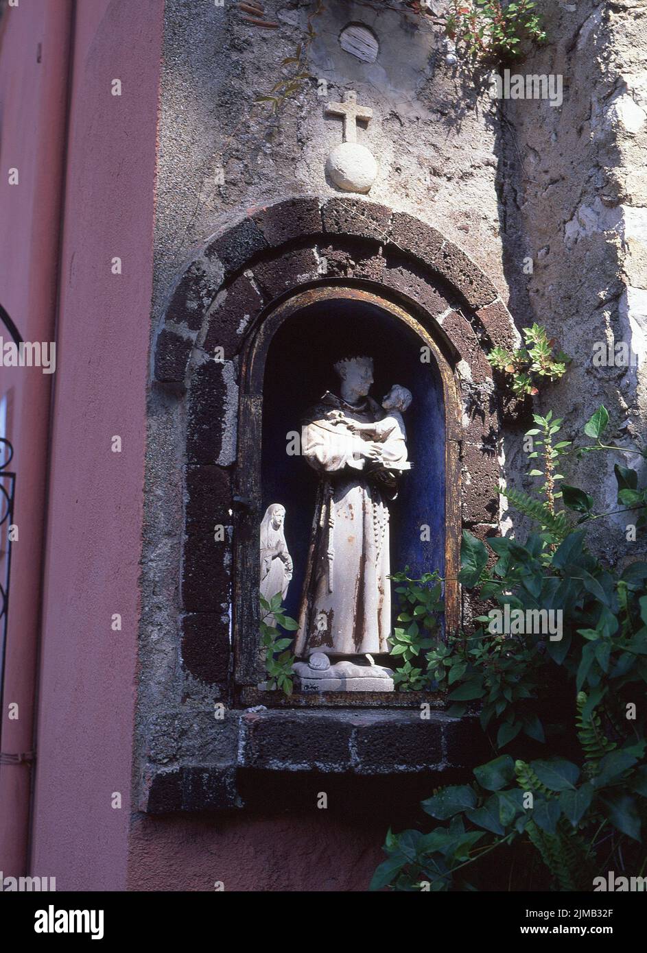 Shrine in wall, Taormina, Sicily Stock Photo - Alamy
