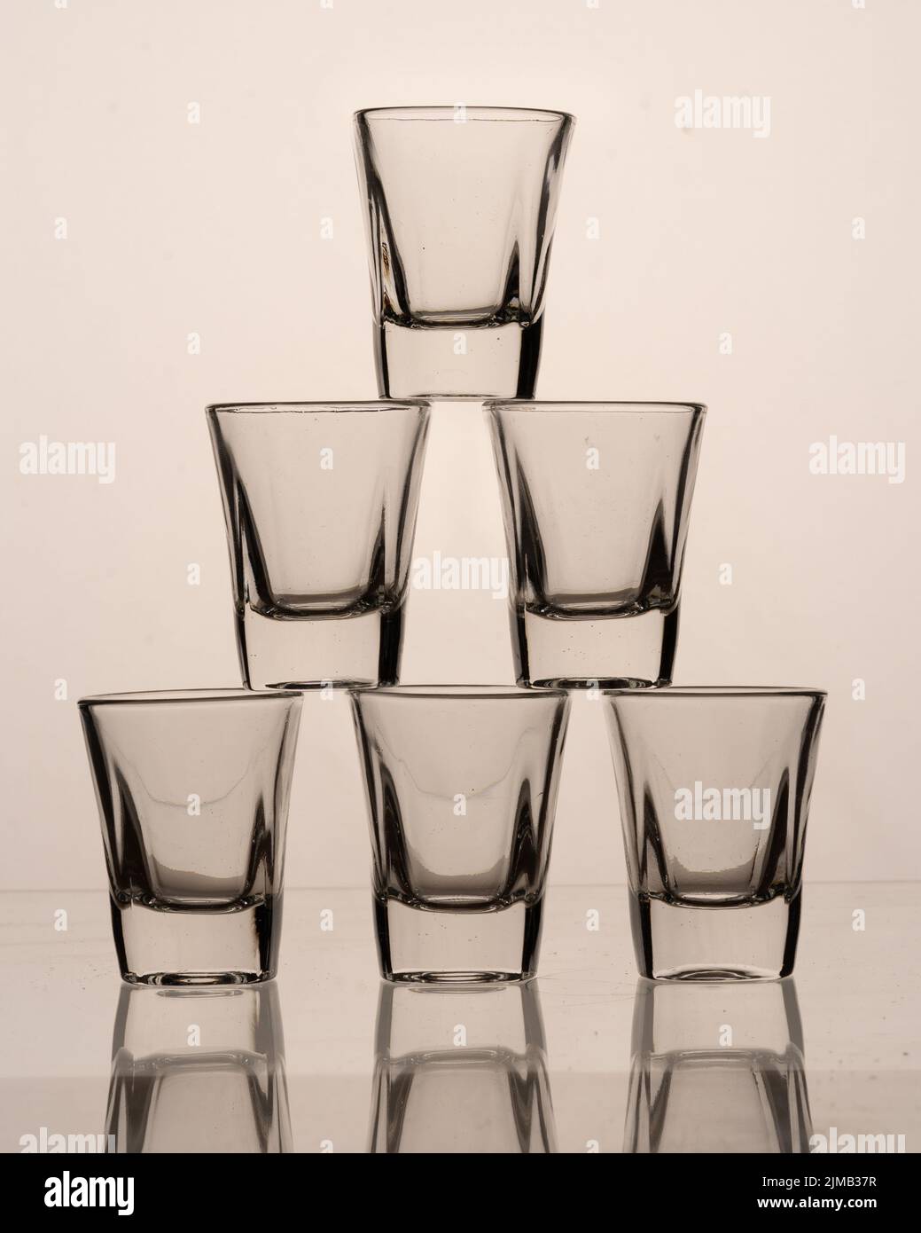 A pyramid of glass cups for liquor Stock Photo - Alamy