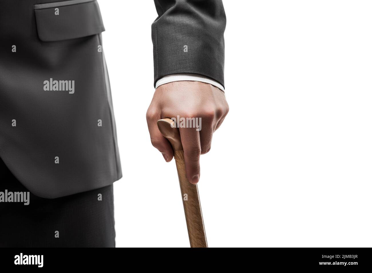 Businessman in black suit holding walking cane stick Stock Photo - Alamy