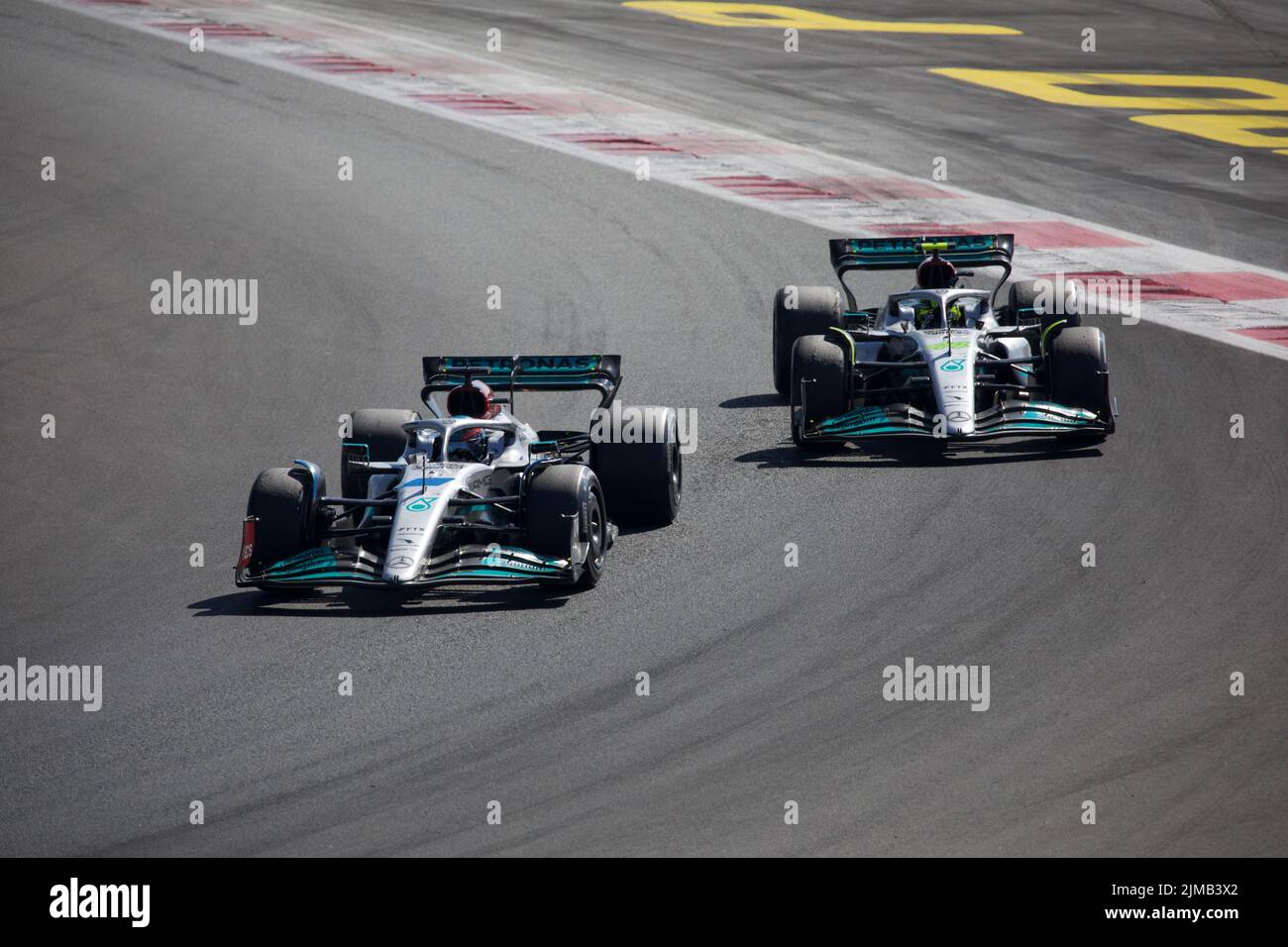 Two race cars on a track racing at high speed during the 2022 French ...