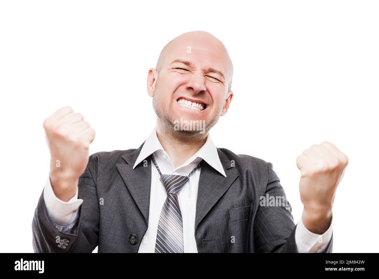 Smiling businessman winner gesturing raised hands fist celebrating ...
