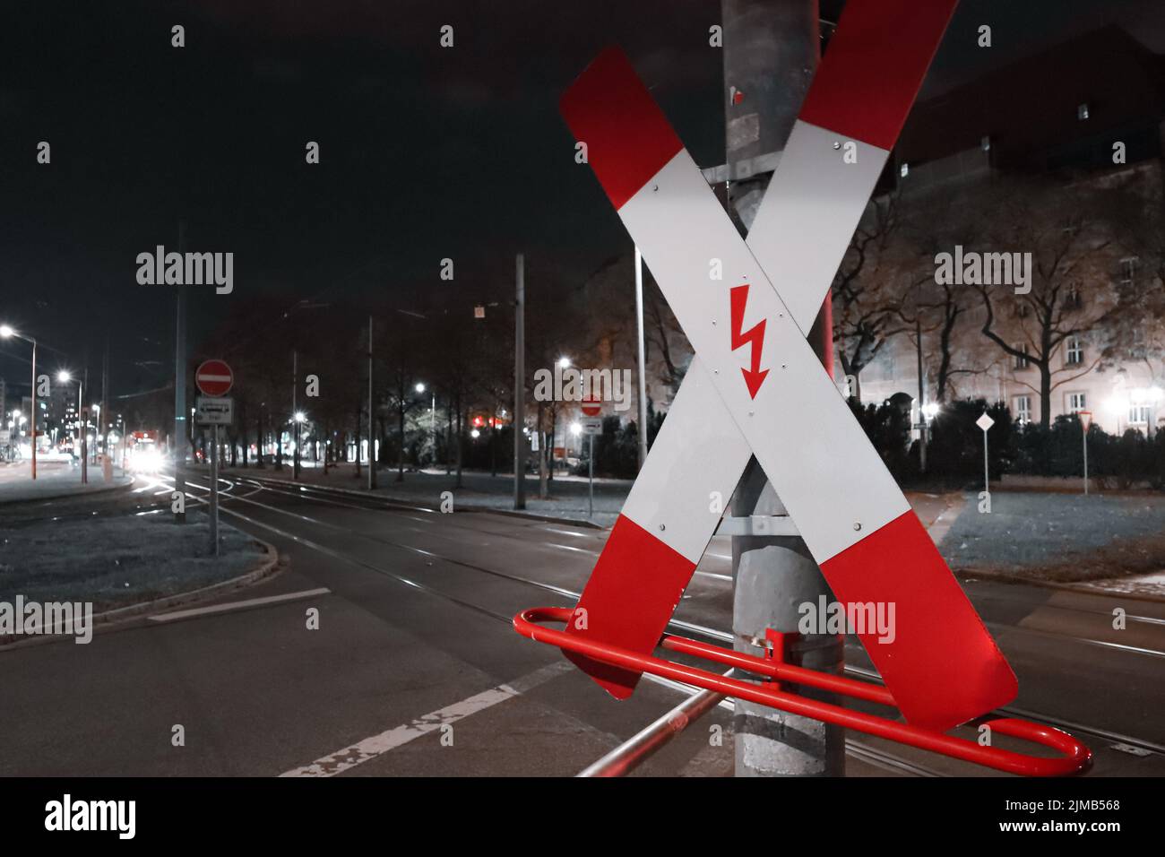 A road sign cross on a streetcar line Stock Photo - Alamy